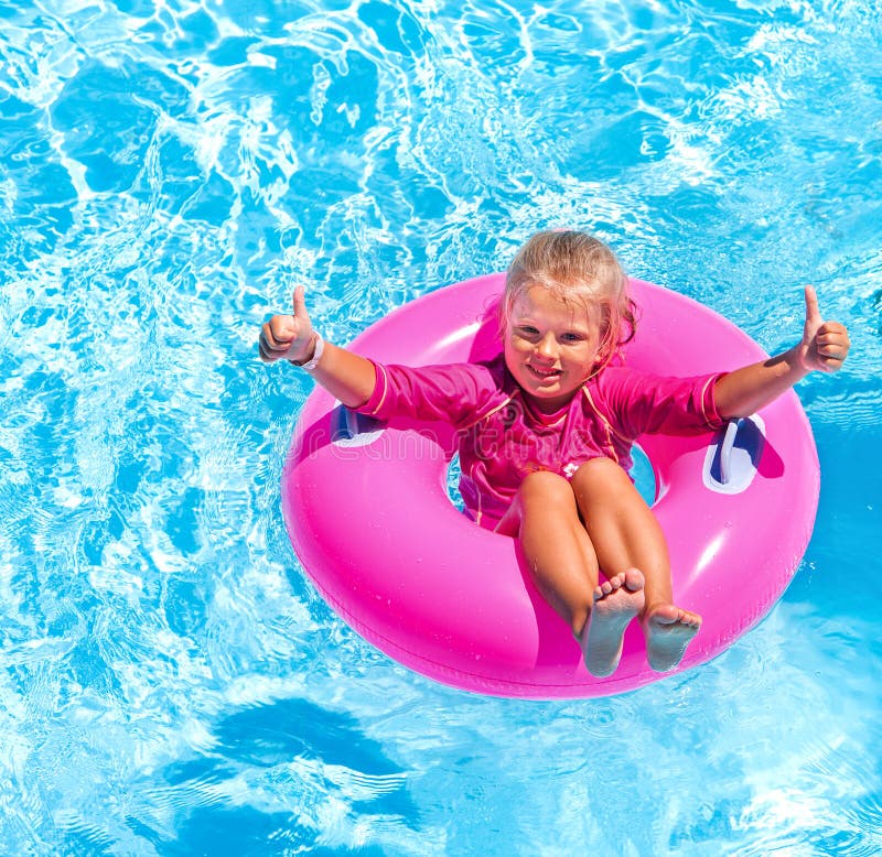 Children Sitting on Inflatable Ring Stock Photo - Image of horizontal ...