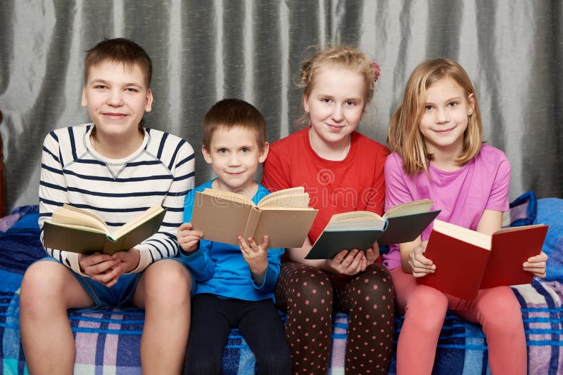 Children Sitting and Reading Books at Home Stock Image - Image of ...