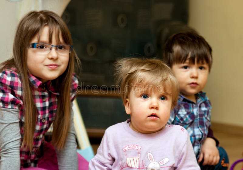 Children sitting together stock image. Image of girl - 19085701