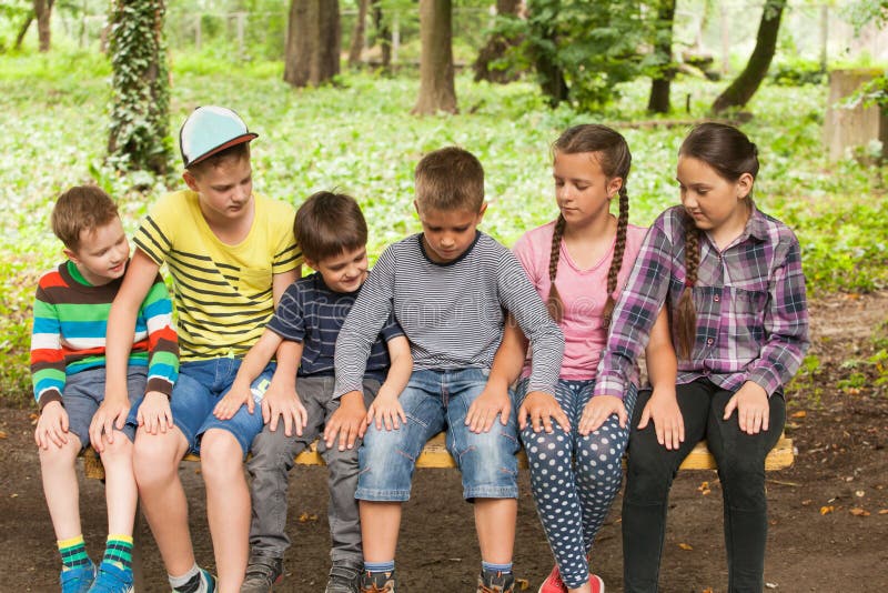 Kids on the bench stock photo. Image of children, clapping - 108404730