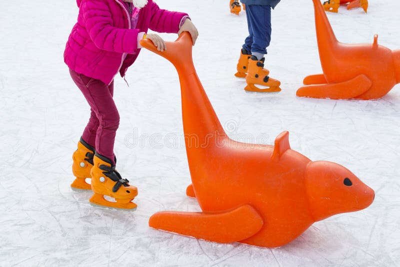 Children skating on ice stock photo. Image of children - 87517984