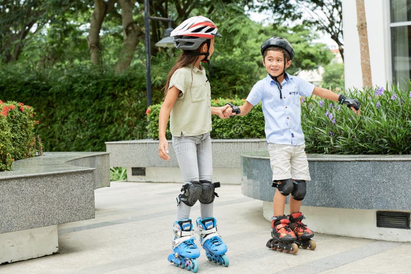 Children Skating Together Outdoors Stock Image - Image of cute, riding ...