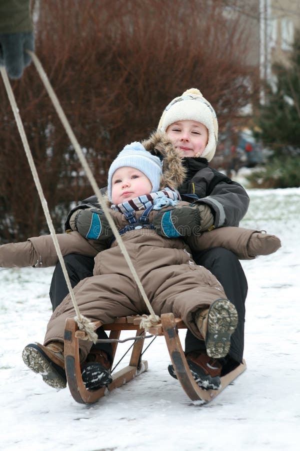 Baby and mom sledding stock photo. Image of riding, seasons - 12385514