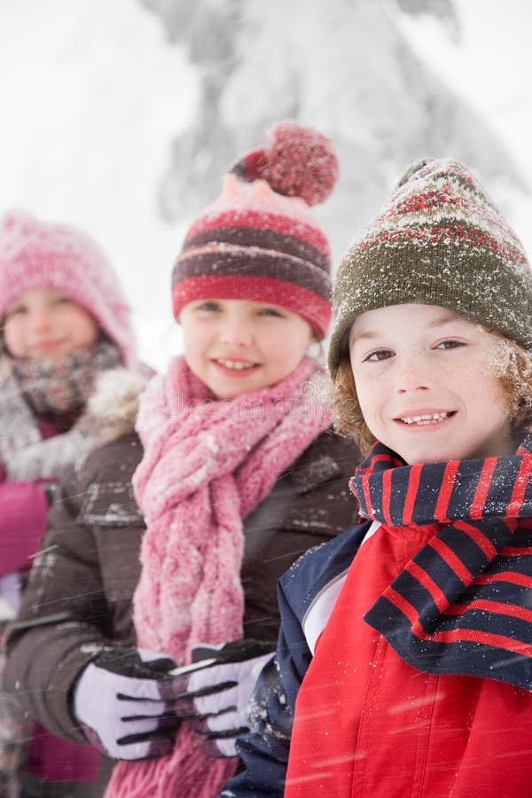 Children in the snow stock photo. Image of child, biracial - 36095408