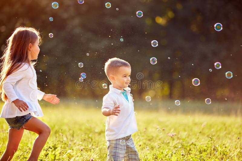 129 Children Chasing Bubbles Stock Photos - Free & Royalty-Free Stock ...