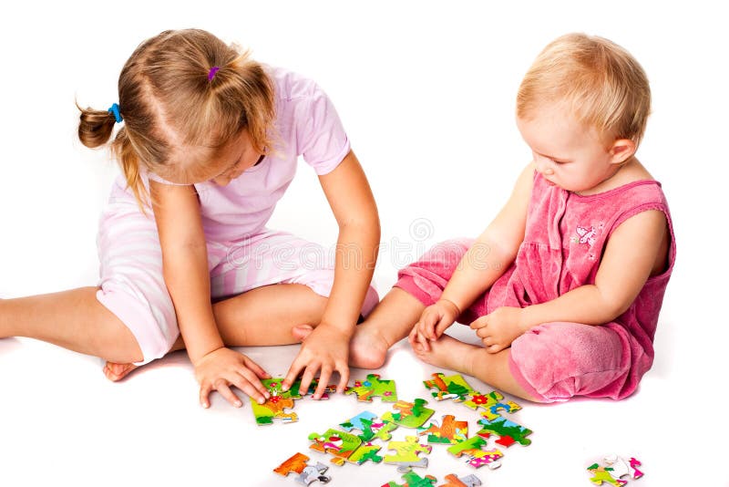 Children Solving Jigsaw Puzzle Stock Image - Image of elementary ...