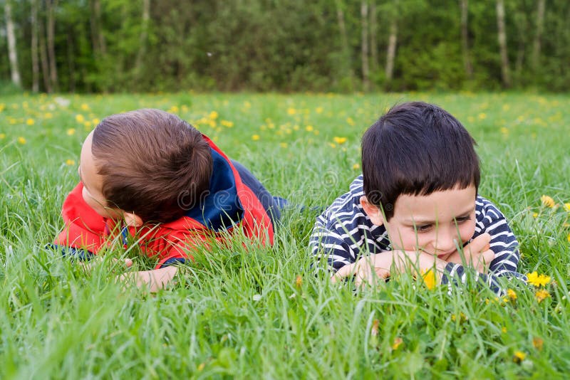 Children in spring nature stock image. Image of field - 64564743