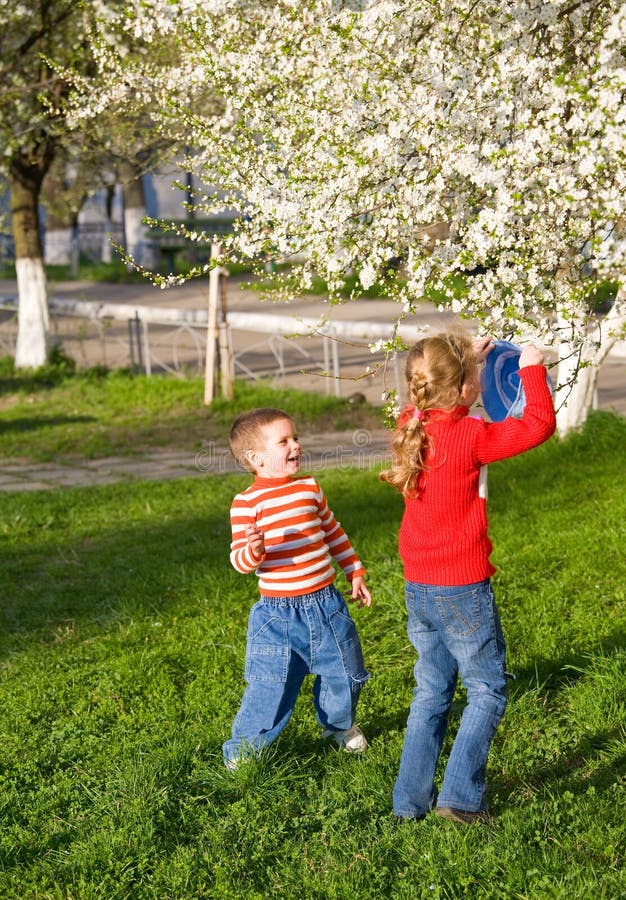 Children in spring park stock photo. Image of glad, florescence - 10659110