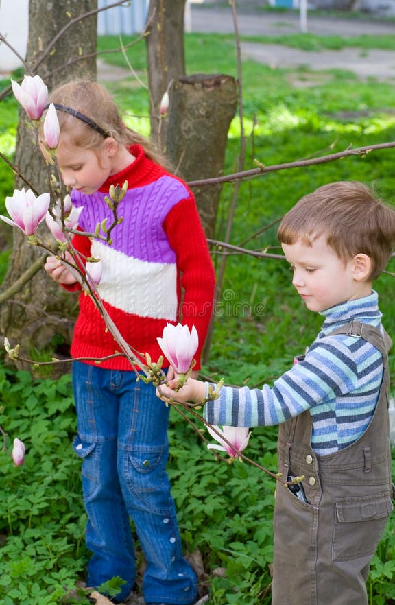 Children in spring park stock image. Image of children - 12665115