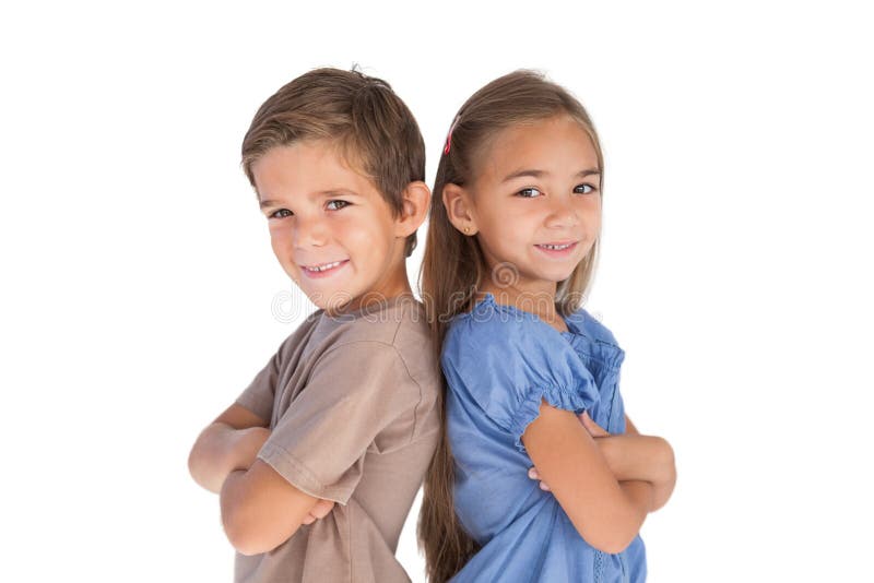 Children Standing Back To Back with Arms Crossed Stock Image - Image of ...