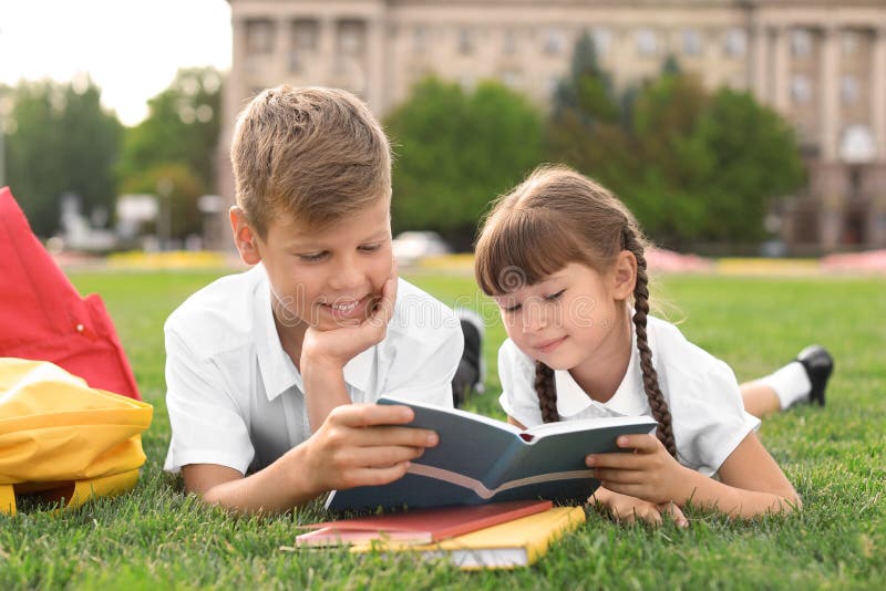 Children with Stationery Doing School Assignment Stock Image - Image of ...