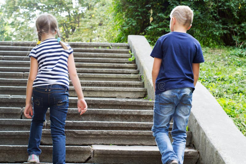 Children on the steps of stock photo. Image of stairs - 44192884