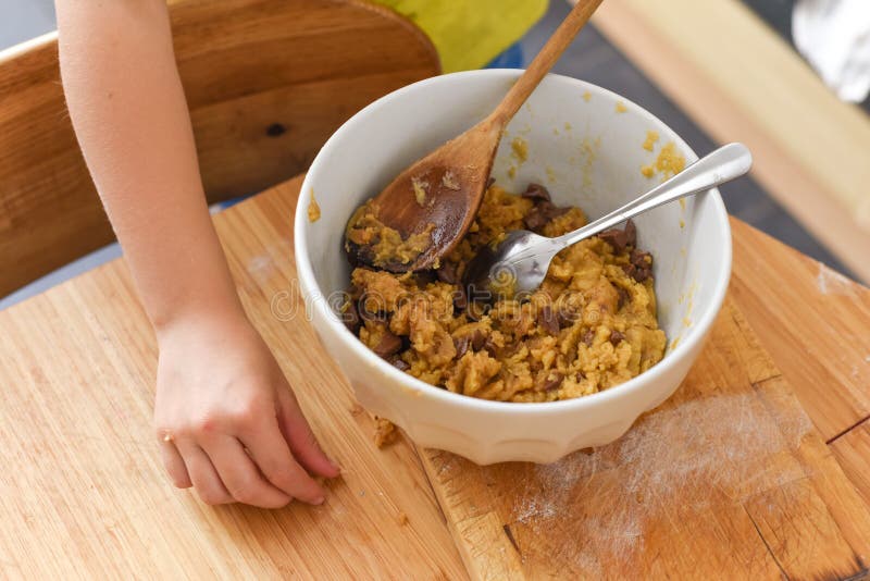 Children Stir a Mixing Bowl in the Kitchen at Home while Baking Cookies ...