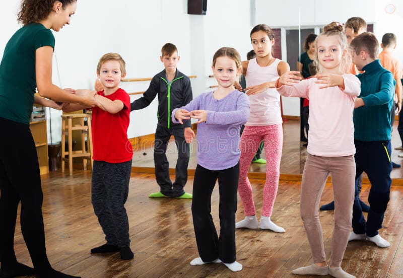 Children studying ballet, Group of children dancing ballet in dance
