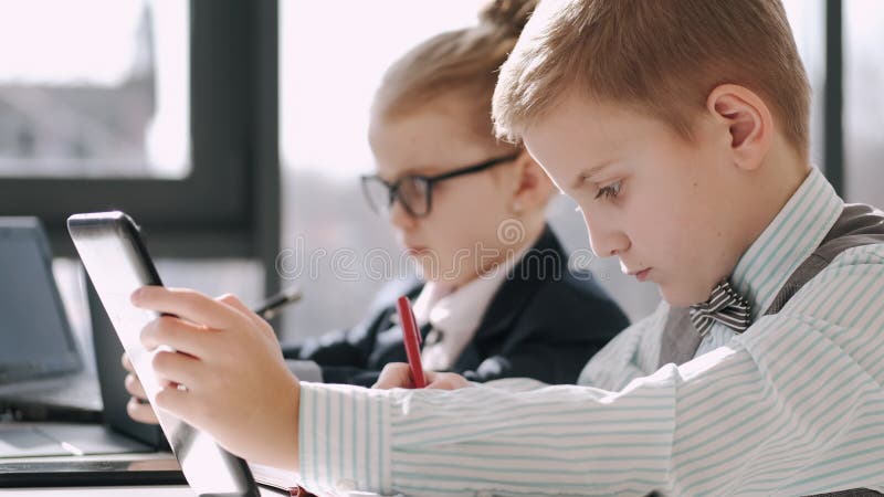 Children are Studying Online Using Tech Tools during Quarantine Stock ...