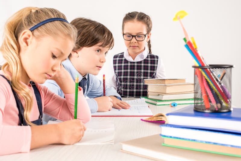 Children Studying Together and Writing Stock Image - Image of school ...