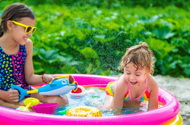 Children Swim in the Pool. Selective Focus Stock Photo - Image of learn ...