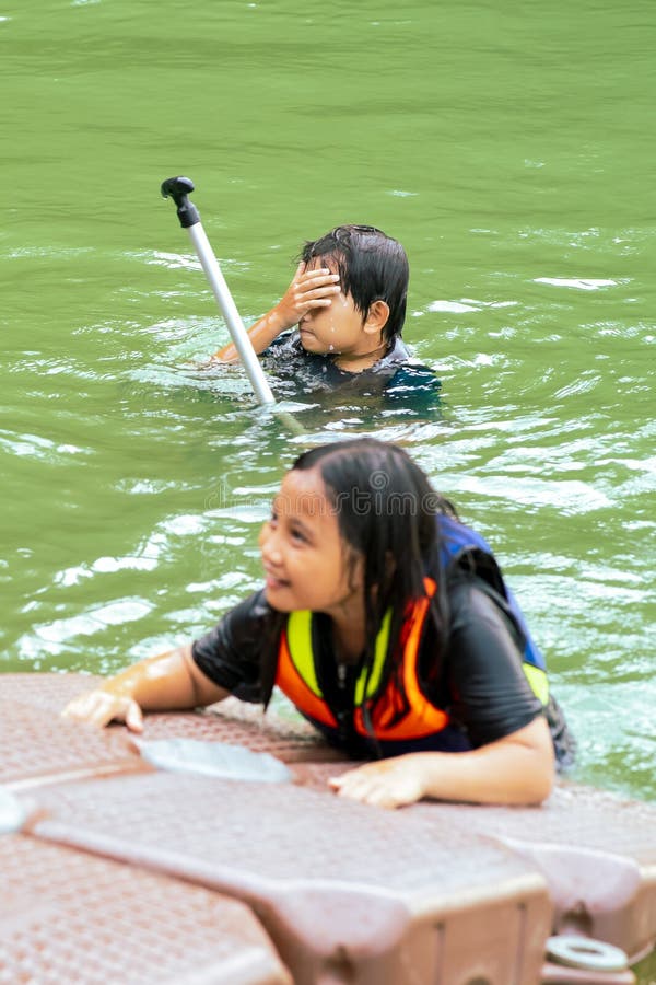 Children Swimming at a Resort in Malaysia Stock Photo - Image of ...