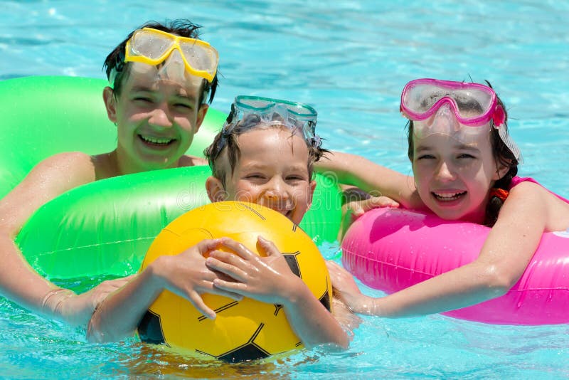 Children in swimming pool stock image. Image of rings - 20337963
