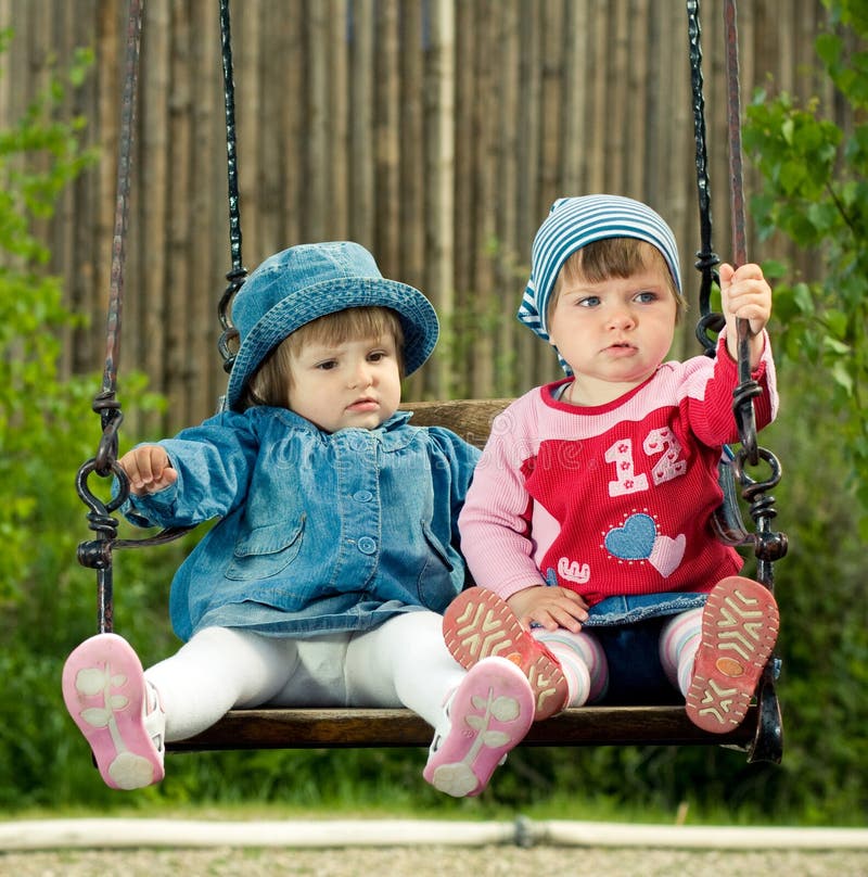 Child on the swings stock photo. Image of carefree, children - 9503376