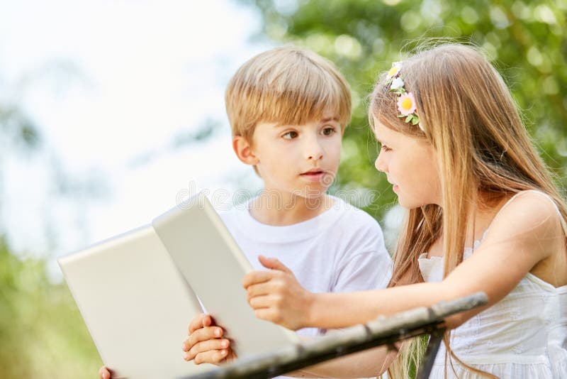 Children with Tablet PC Marvel at Chat Message Stock Image - Image of ...