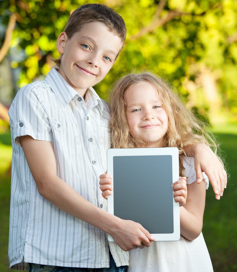 Children with Tablet Pc Outdoors Stock Photo - Image of girl, child ...