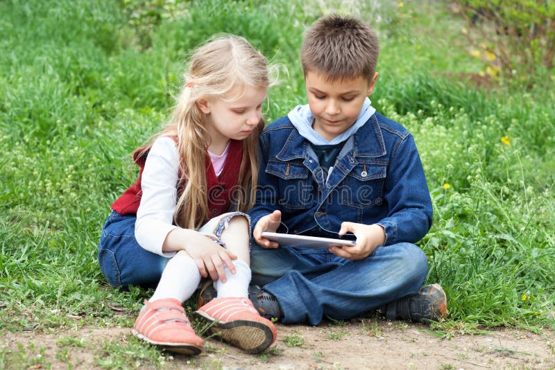 Children with Tablet PC Outdoors Stock Image - Image of cheerful ...