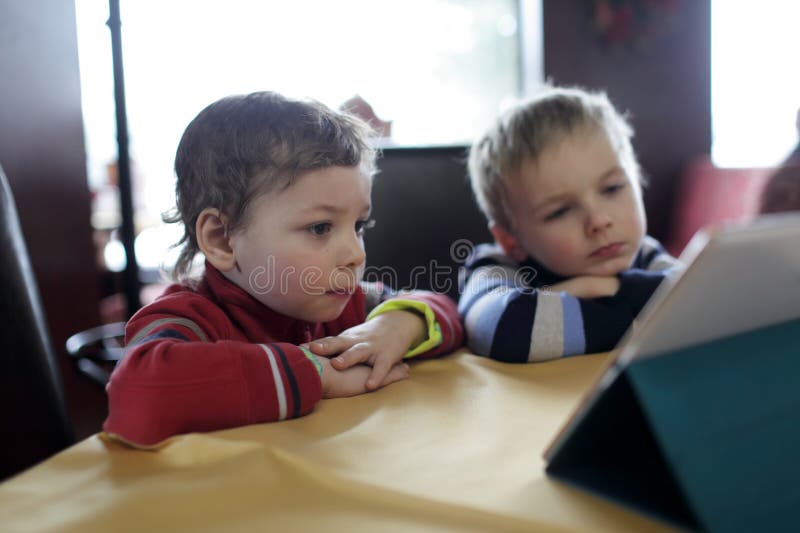 Children with tablet PC stock image. Image of childhood - 48801213