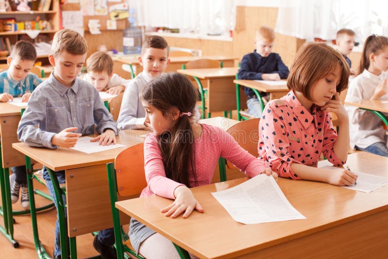 Children taking an exam stock image. Image of person - 109458887