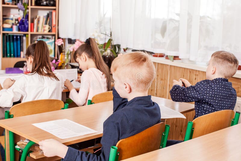 Children taking an exam stock photo. Image of junior - 109030336