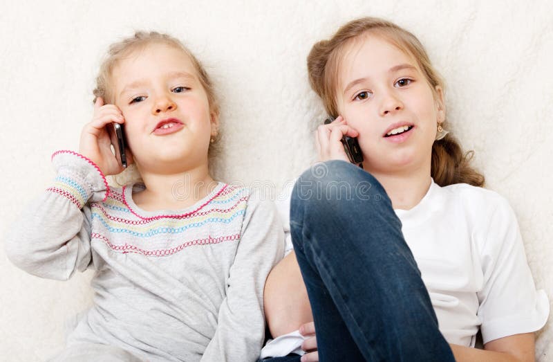 Children Talking on Mobile Phone Stock Photo - Image of communications ...