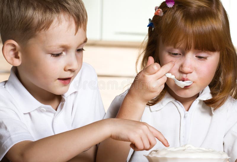 Children taste sweet stock image. Image of people, spoon - 11667871