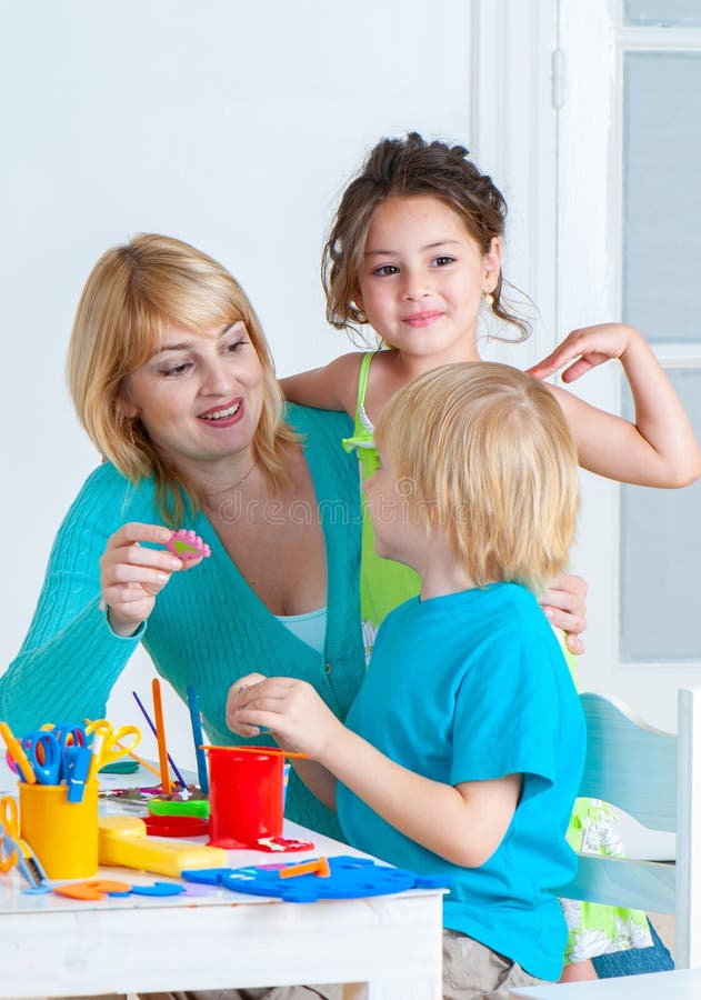 Children with a Teacher in a Kindergarten at a Labor Lesson Stock Photo ...