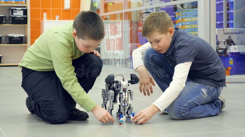 Children Testing Robot at School Robotics Lab. Stock Video - Video of ...