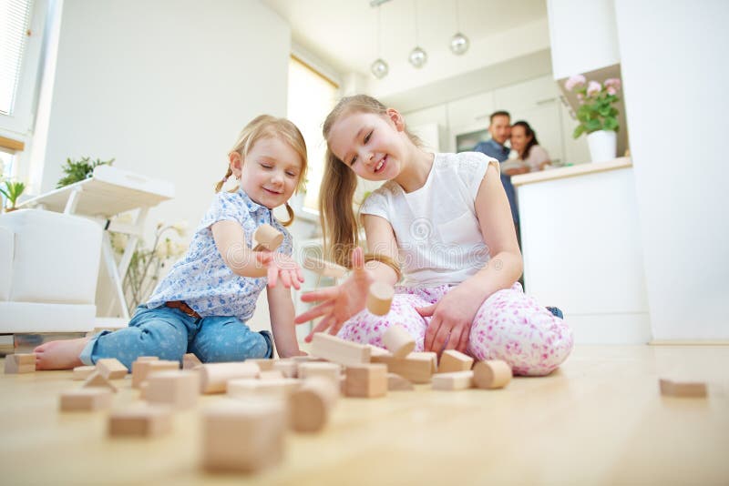 Children Throw Blocks Over while Playing Stock Photo - Image of kids ...