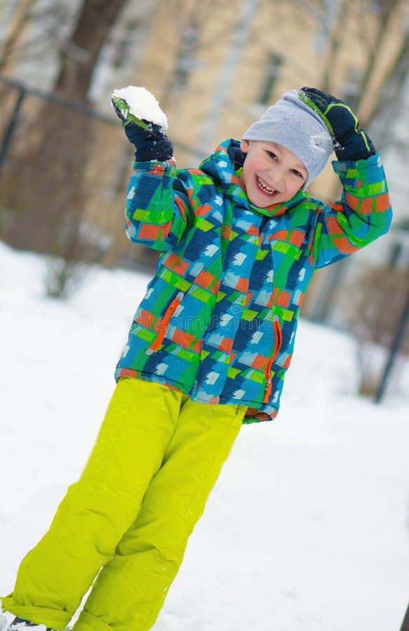 Children Throwing Snowballs Stock Image - Image of sister, active: 49664249