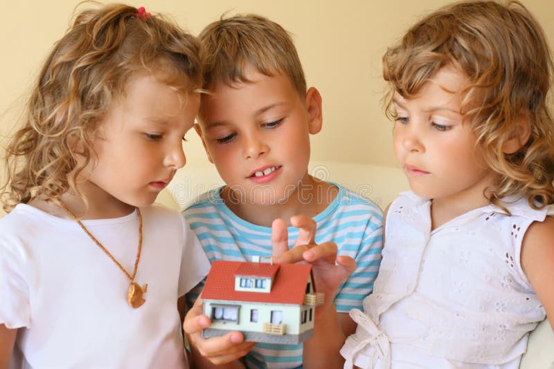 Children Together Keeping in Hands Model of House Stock Photo - Image ...