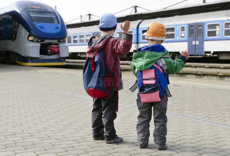 Children at train station stock photo. Image of traveling - 39805154