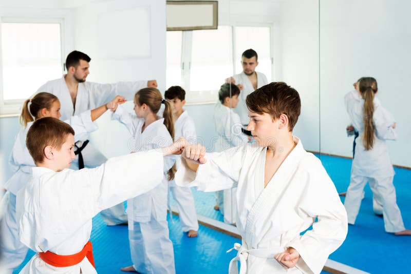 Children training in pairs stock photo. Image of authentic - 91038682