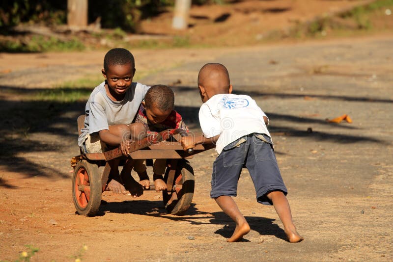 Children with a trolley editorial image. Image of child - 28272750