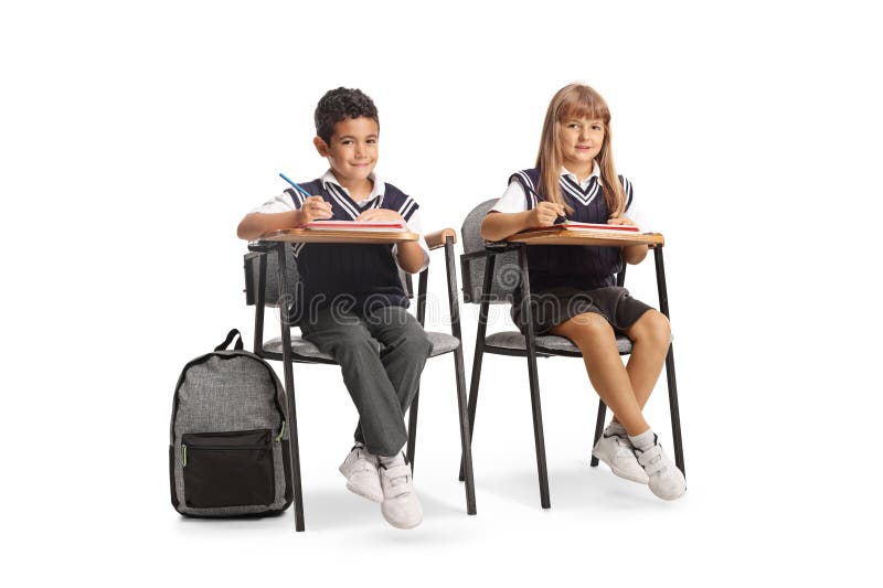 Children in Uniforms Sitting in School Chairs Stock Image - Image of ...