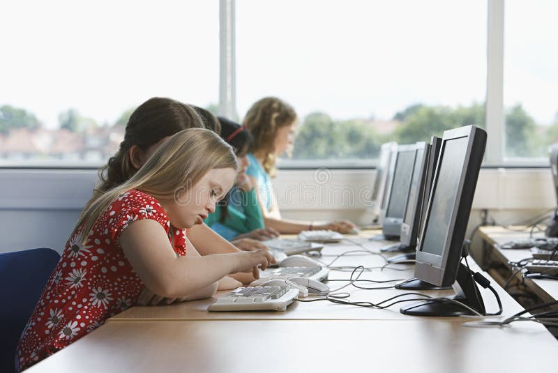 Children (10-12) Using Computer in Computer Lab Stock Image - Image of ...