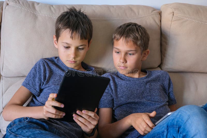 Children Using Digital Tablet Computer at Home. Technology, Online ...