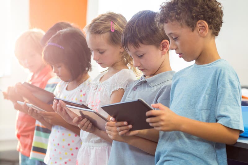 School Kids Using Digital Tablets Stock Image - Image of female ...