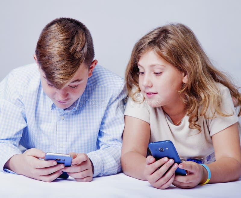 Children Using Electronic Gadgets As a Symbol of Dependence on S Stock ...