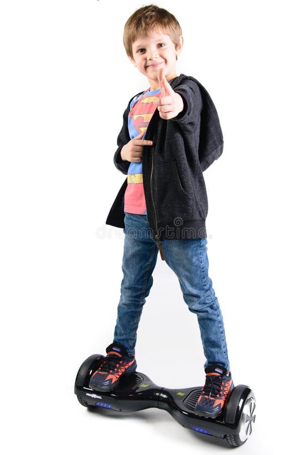 Children Using Hoverboard, a Self-balancing Two-wheeled Board ...