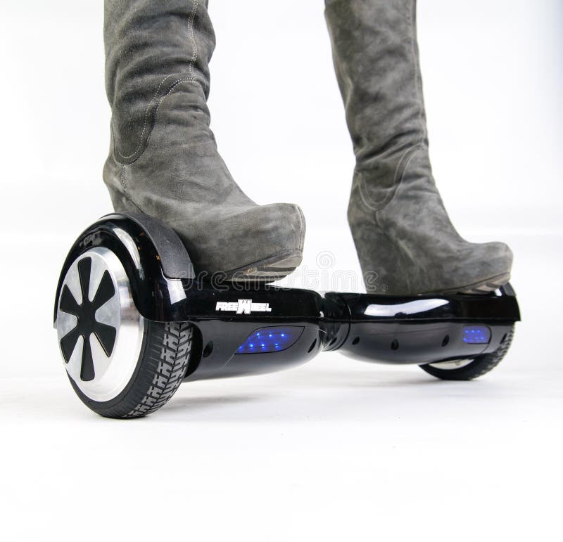 BUCHAREST, ROMANIA, - April 2, 2016: People Using Hoverboard, a Self ...