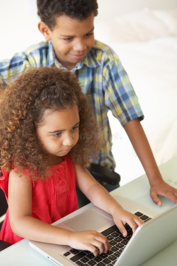 Children Using Laptop at Home Stock Image - Image of families, daughter ...
