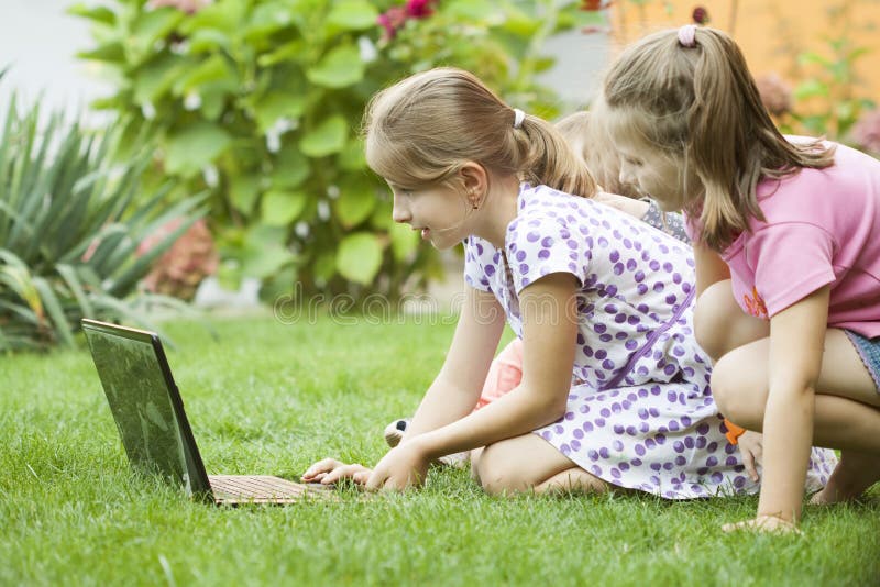 Children Using Laptop in the Meadow Stock Image - Image of education ...