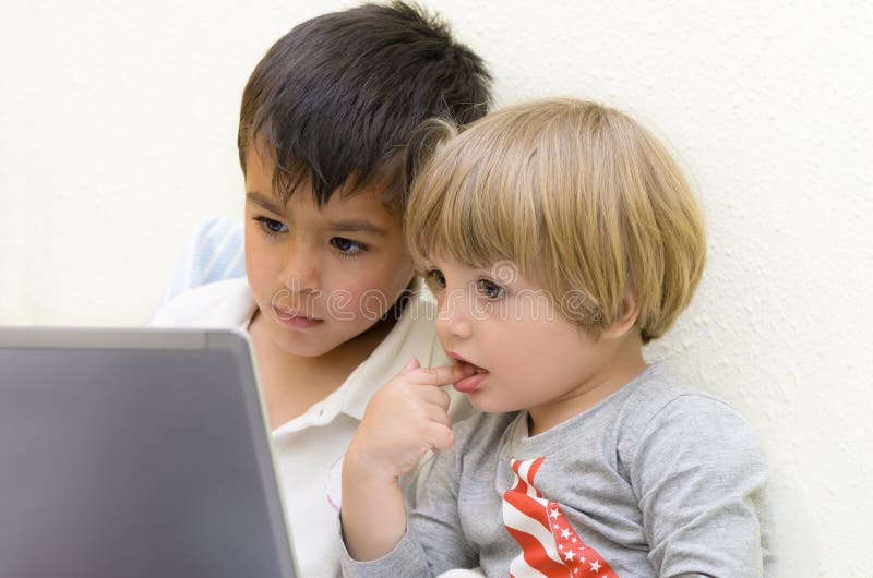 Children using laptop stock image. Image of child, brothers - 51622459